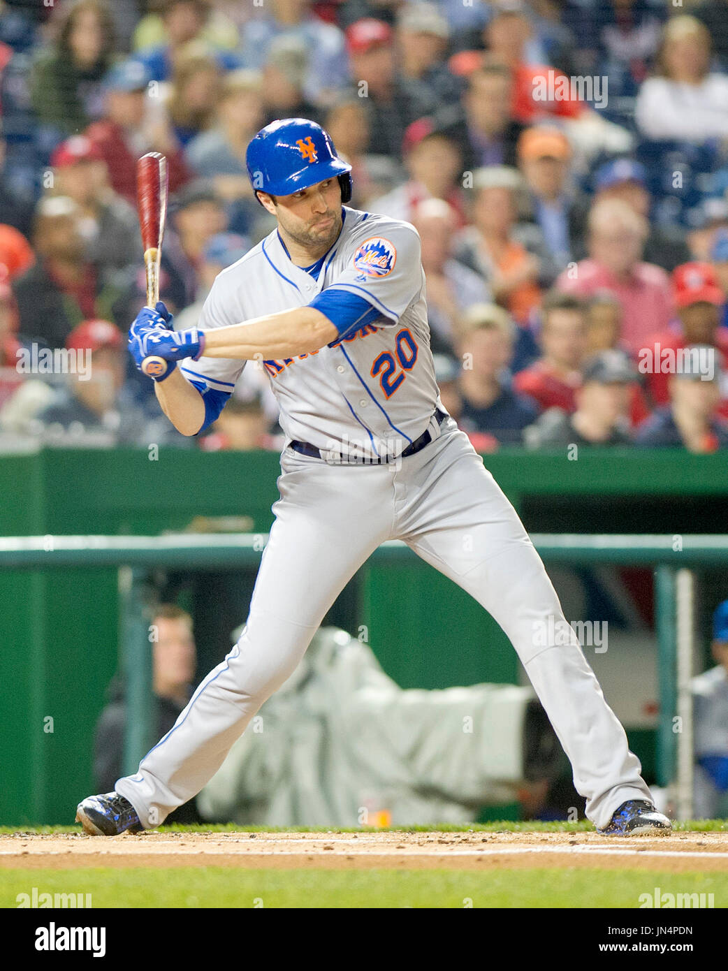 New York Mets second baseman Neil Walker (20) bats in the first inning ...