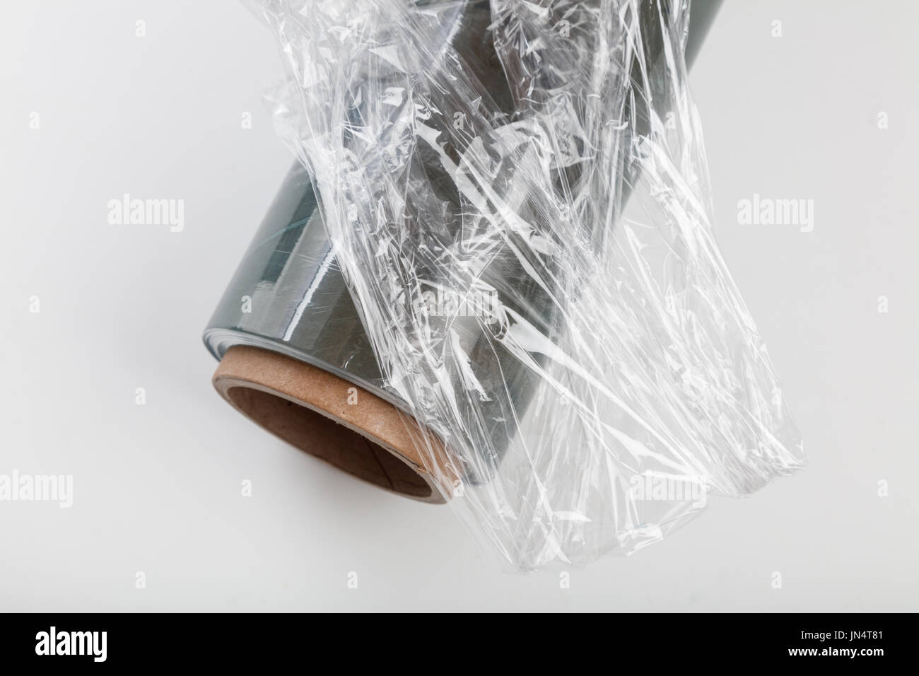 wrapping plastic transparent food film on white background Stock Photo ...