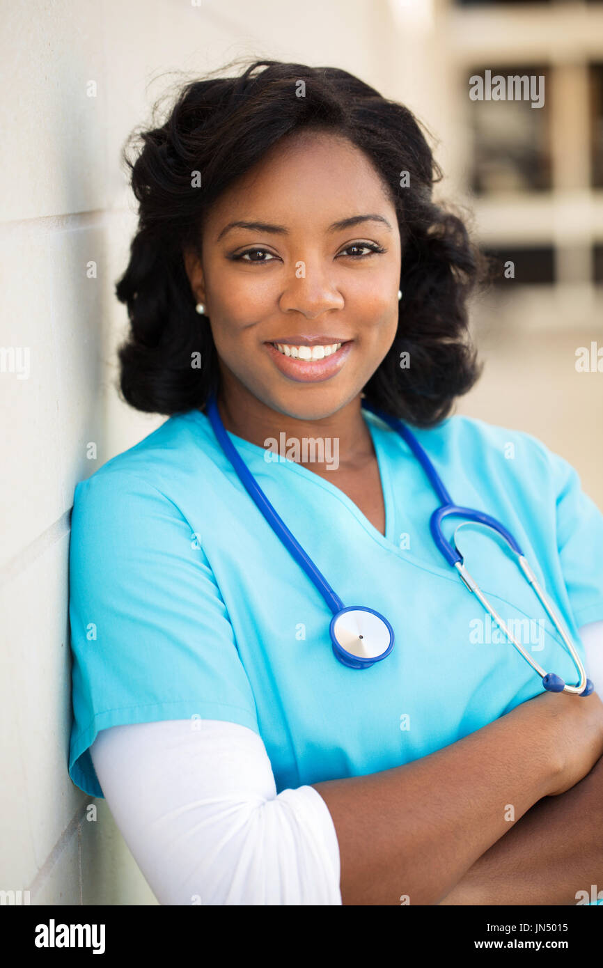 Beautiful young african female doctor hi-res stock photography and ...