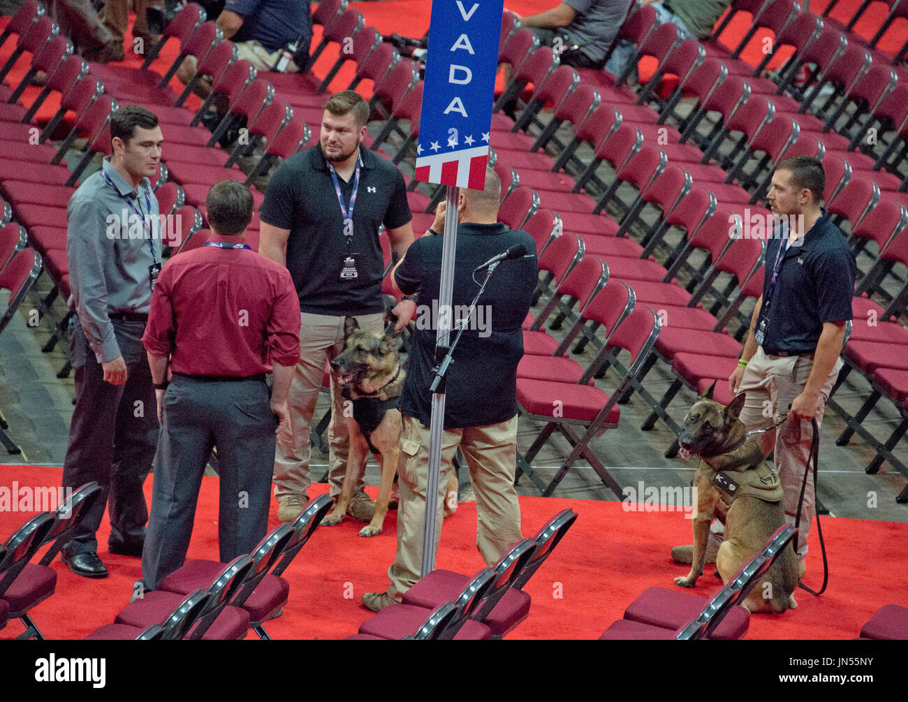 Security dogs and their handlers on the floor as they prepare for the ...