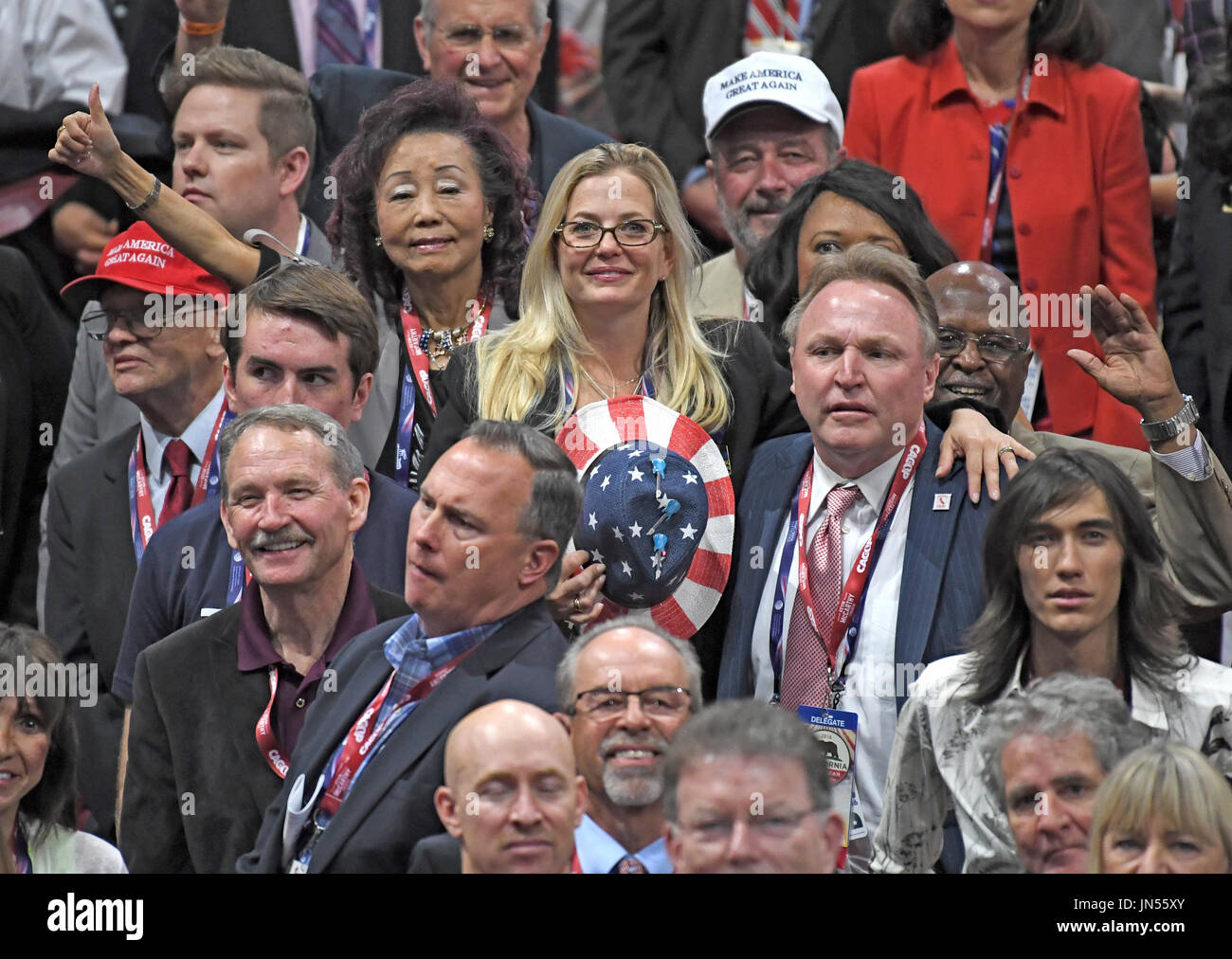 Convention delegates pose for a group photo during the Monday afternoon ...