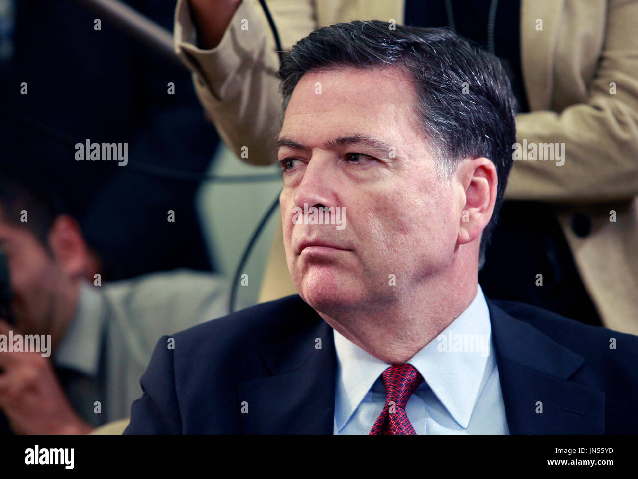 FBI Director James Comey looks on as United States President Barack ...