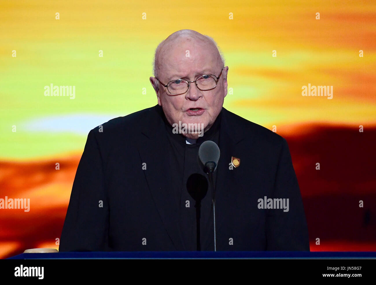 Reverend William Byron gives the Invocation to open the third session ...