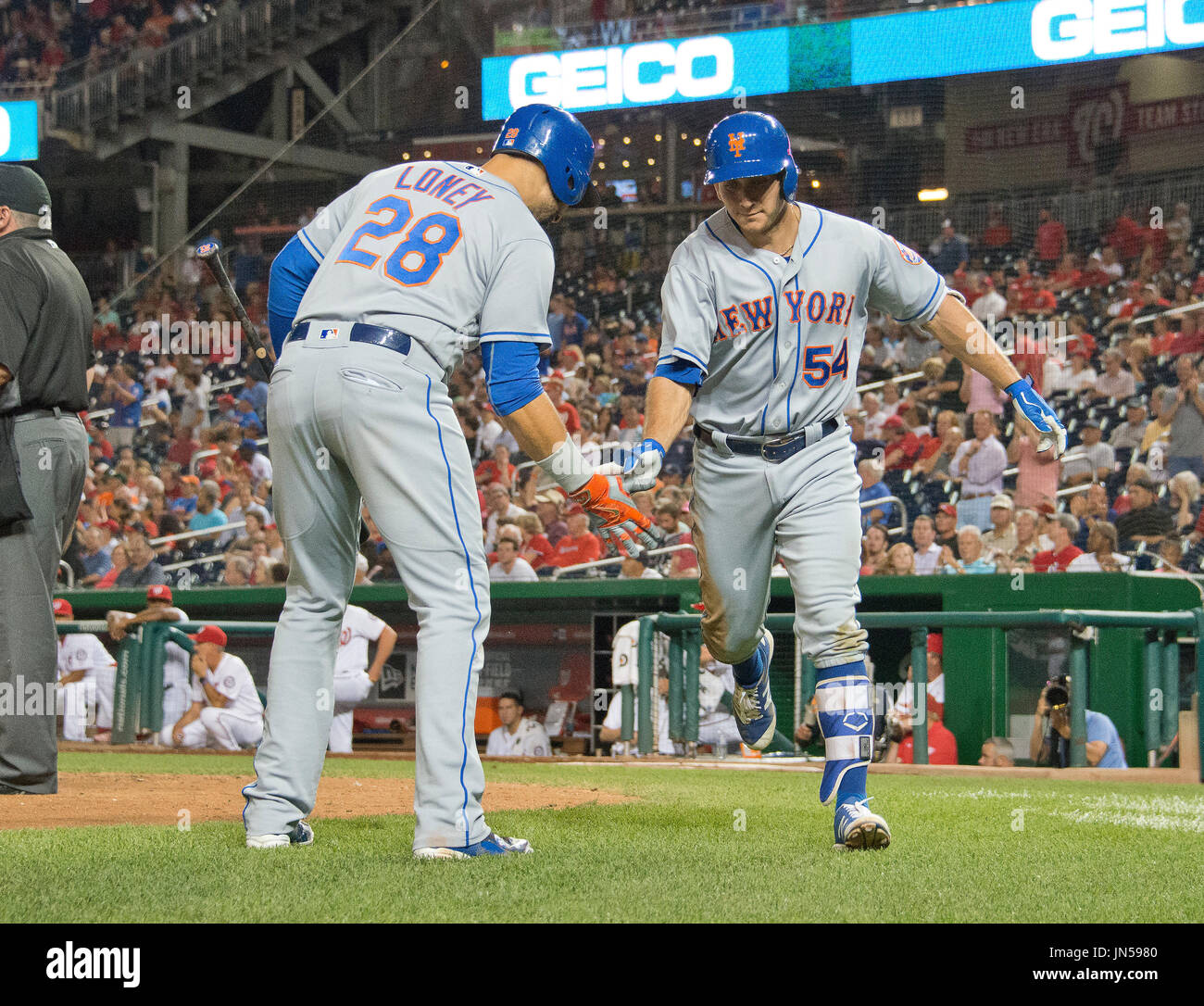 New York Mets third baseman T.J. Rivera (54) celebrates his game ...