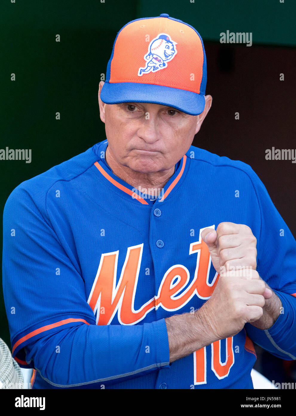 New York Mets manager Terry Collins (10) demonstrates a batter's swing ...