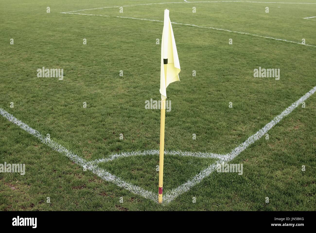 Yellow flag in corner of football playground, lazy wind blowing Stock ...