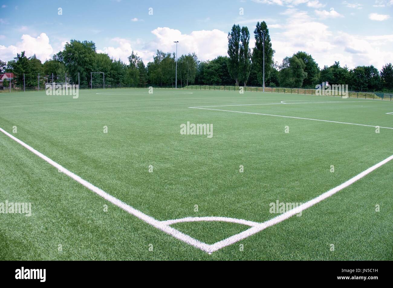White corner line on green football field Stock Photo - Alamy