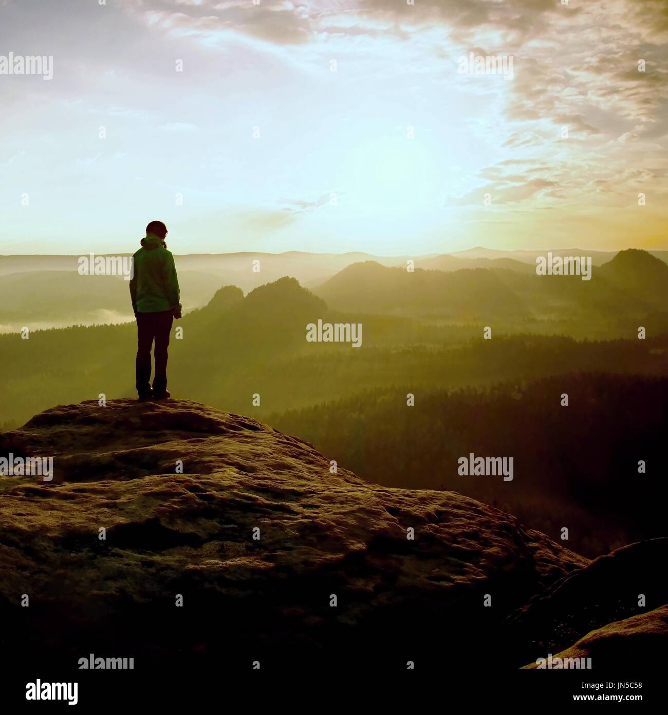 Hiker stand on the sharp corner of sandstone rock in rock empires park ...