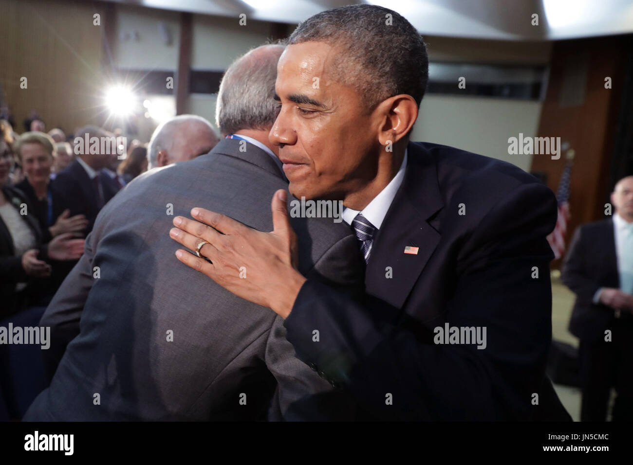 United States President Barack Obama (R) greets State Department staff ...