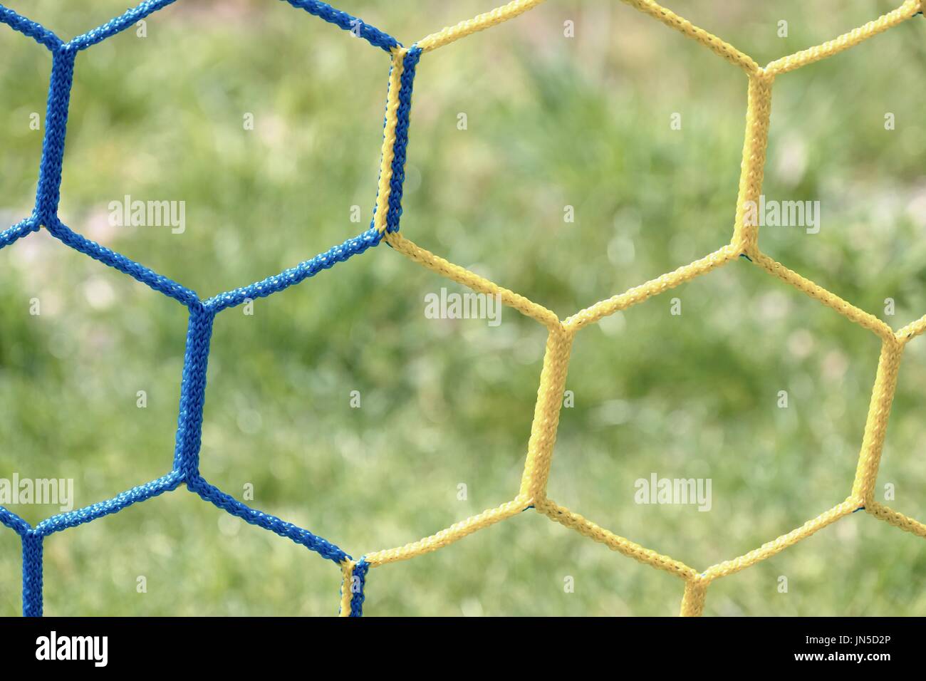 Soccer ball in goal nets hi-res stock photography and images - Alamy