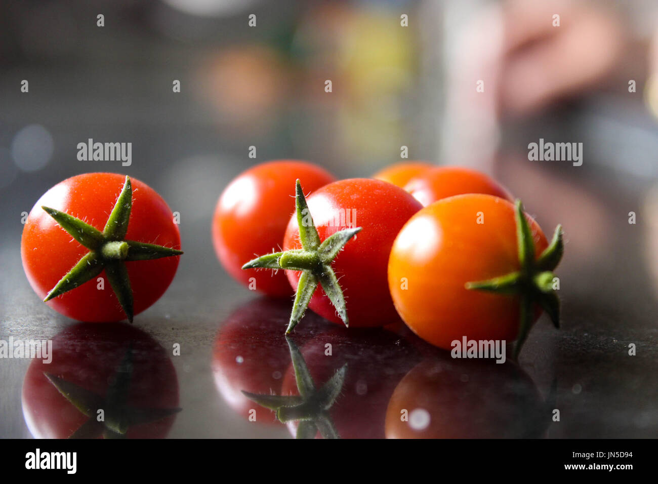 garden mini tomatoes Stock Photo - Alamy