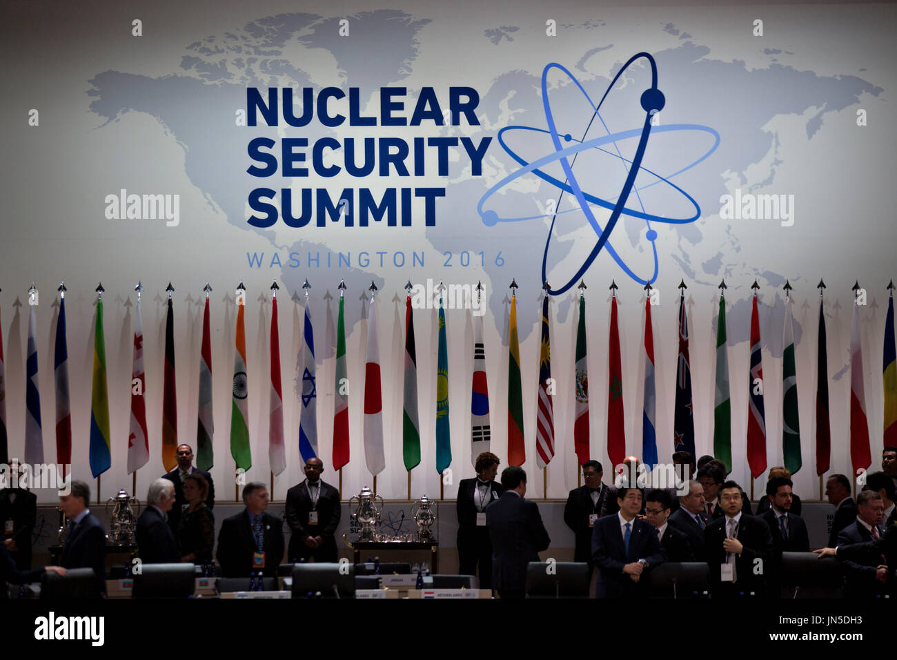 The Nuclear Security Summit logo stands above flags before an opening ...