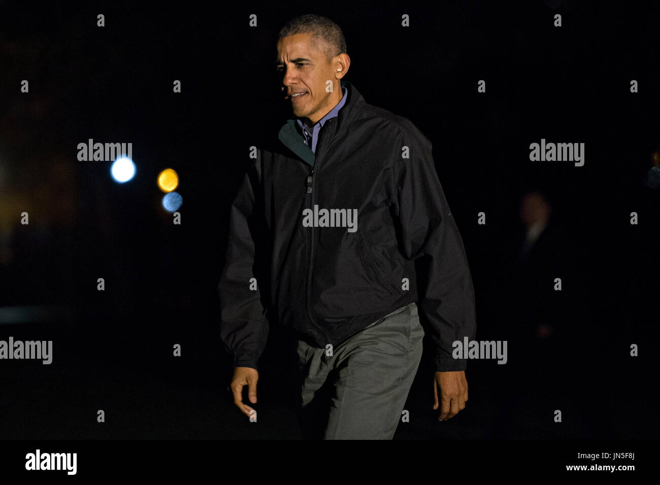 United States President Barack Obama walks on the South Lawn towards ...