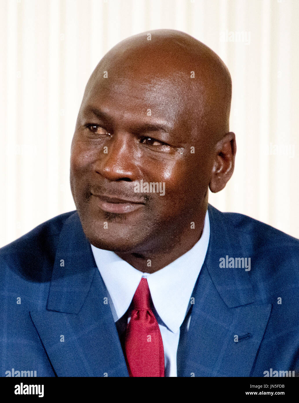 Former NBA star Michael Jordan looks on as United States President ...