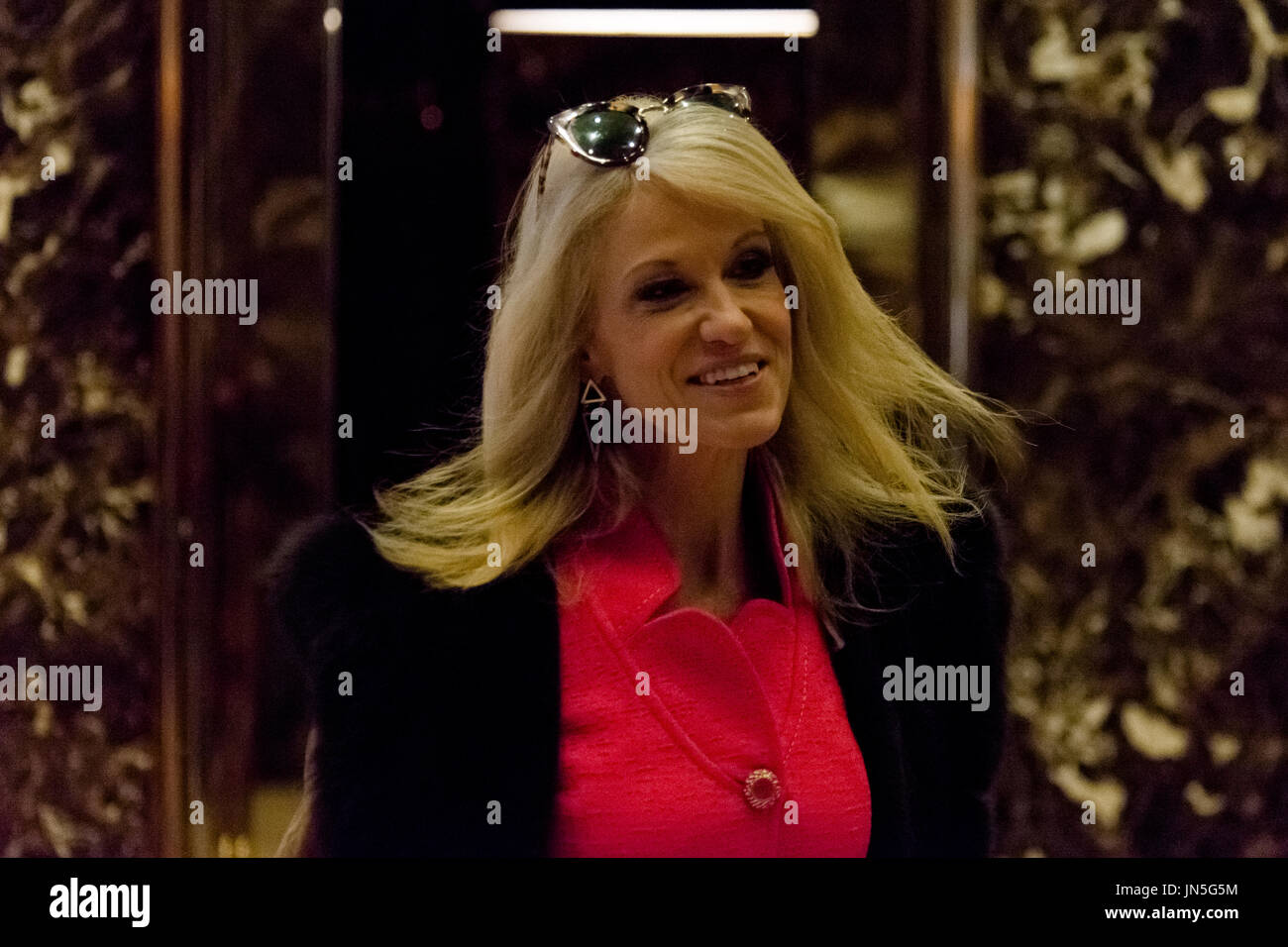 Trump campaign manager Kellyanne Conway exits an elevator in the lobby ...