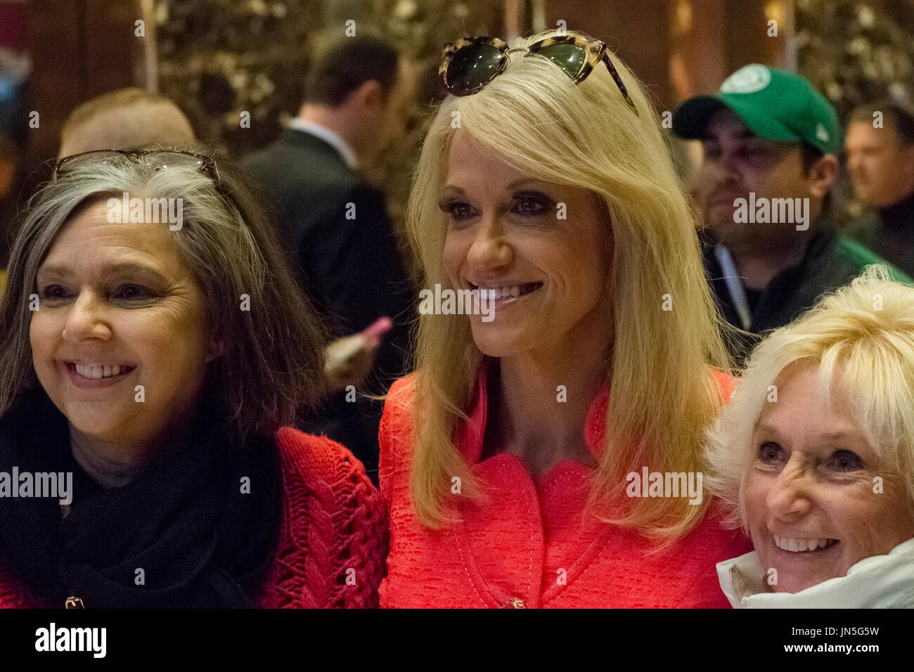Trump campaign manager Kellyanne Conway poses for a photo with tourists ...
