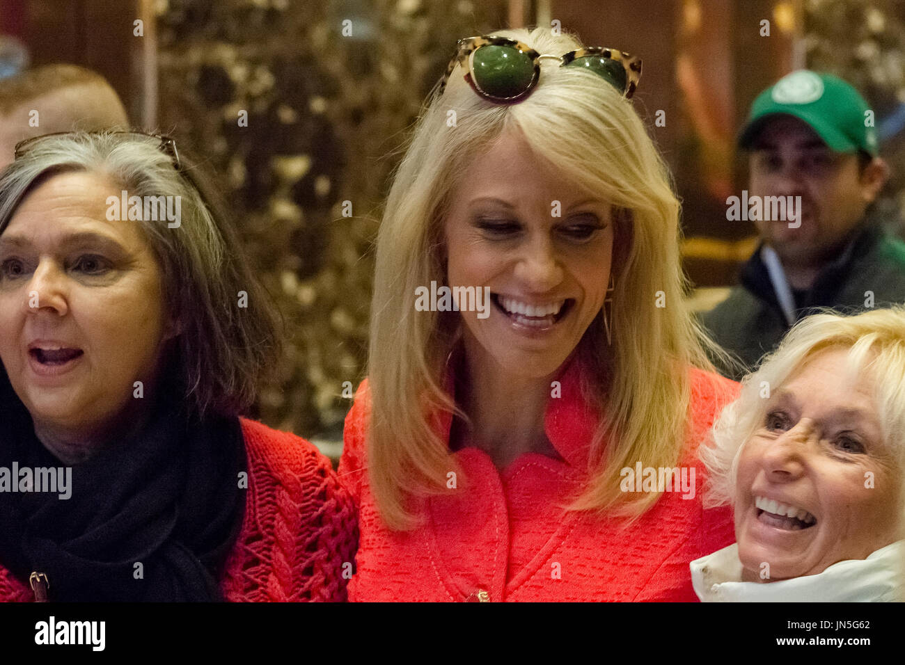 Trump campaign manager Kellyanne Conway poses for a photo with tourists ...