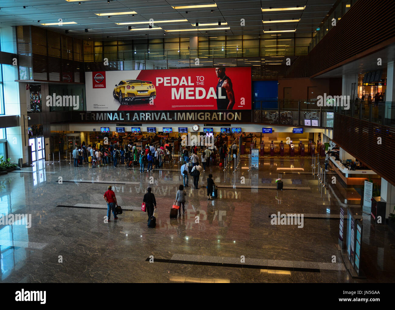 Singapore - May 12, 2016. Immigration Hall at Changi Airport in ...