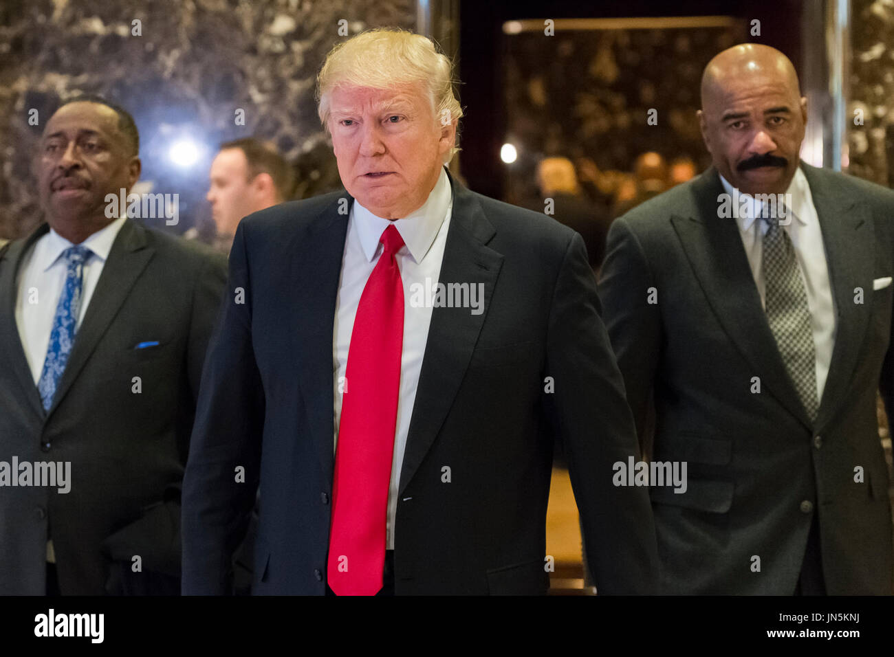 President-elect Donald Trump (L) and media host Steve Harvey (R) are ...