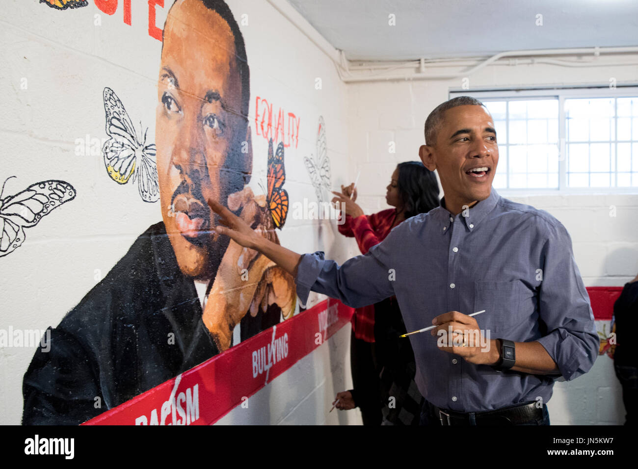 US President Barack Obama (Front) and First Lady Michelle Obama (Back ...