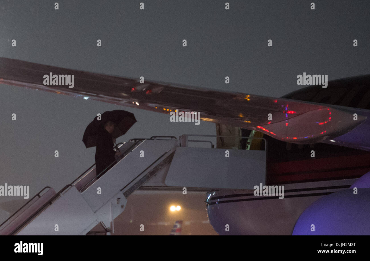 United States President-elect Donald Trump, boards his plane at ...