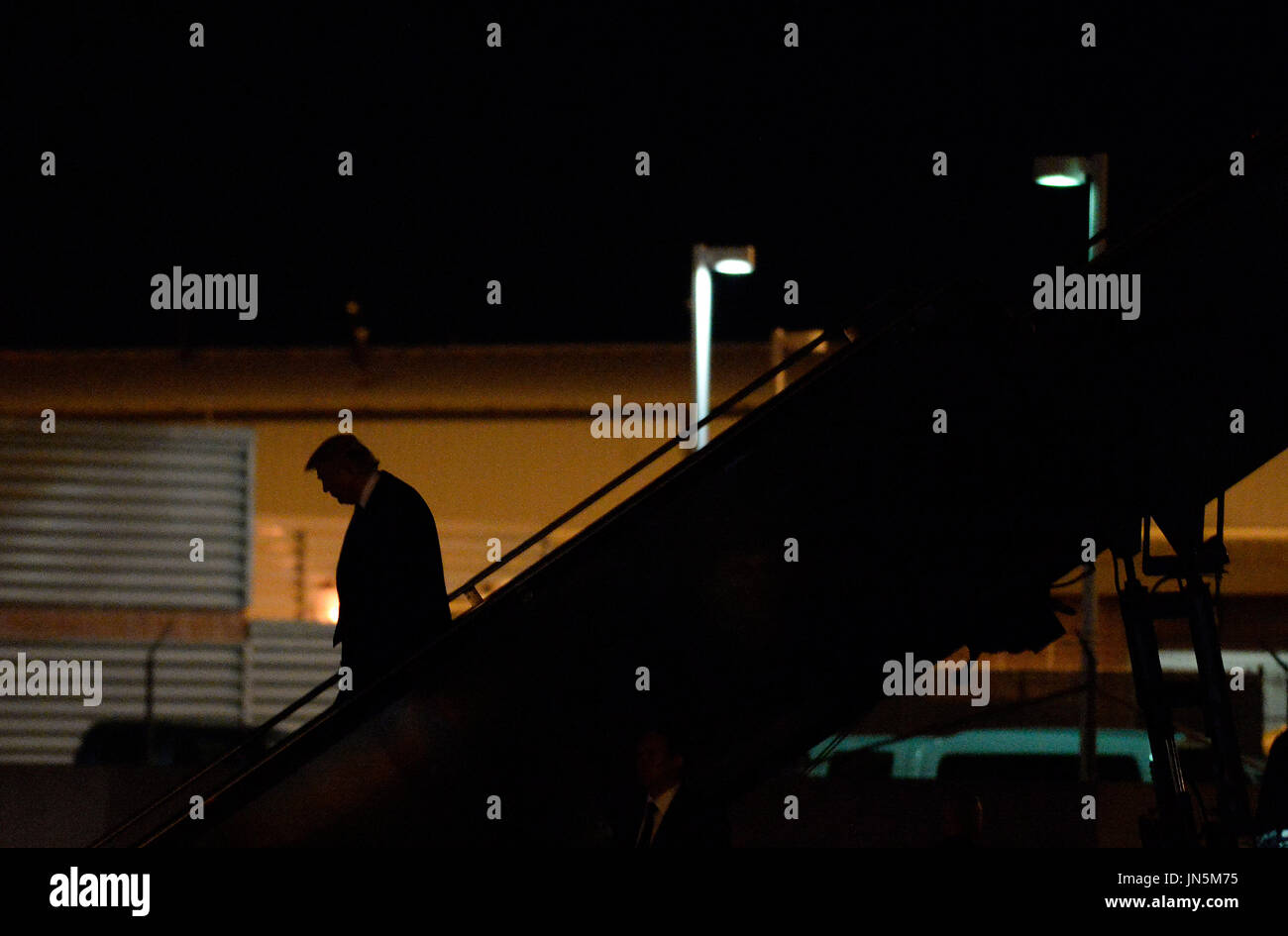 United States President-elect Donald Trump's walks out his plane at ...