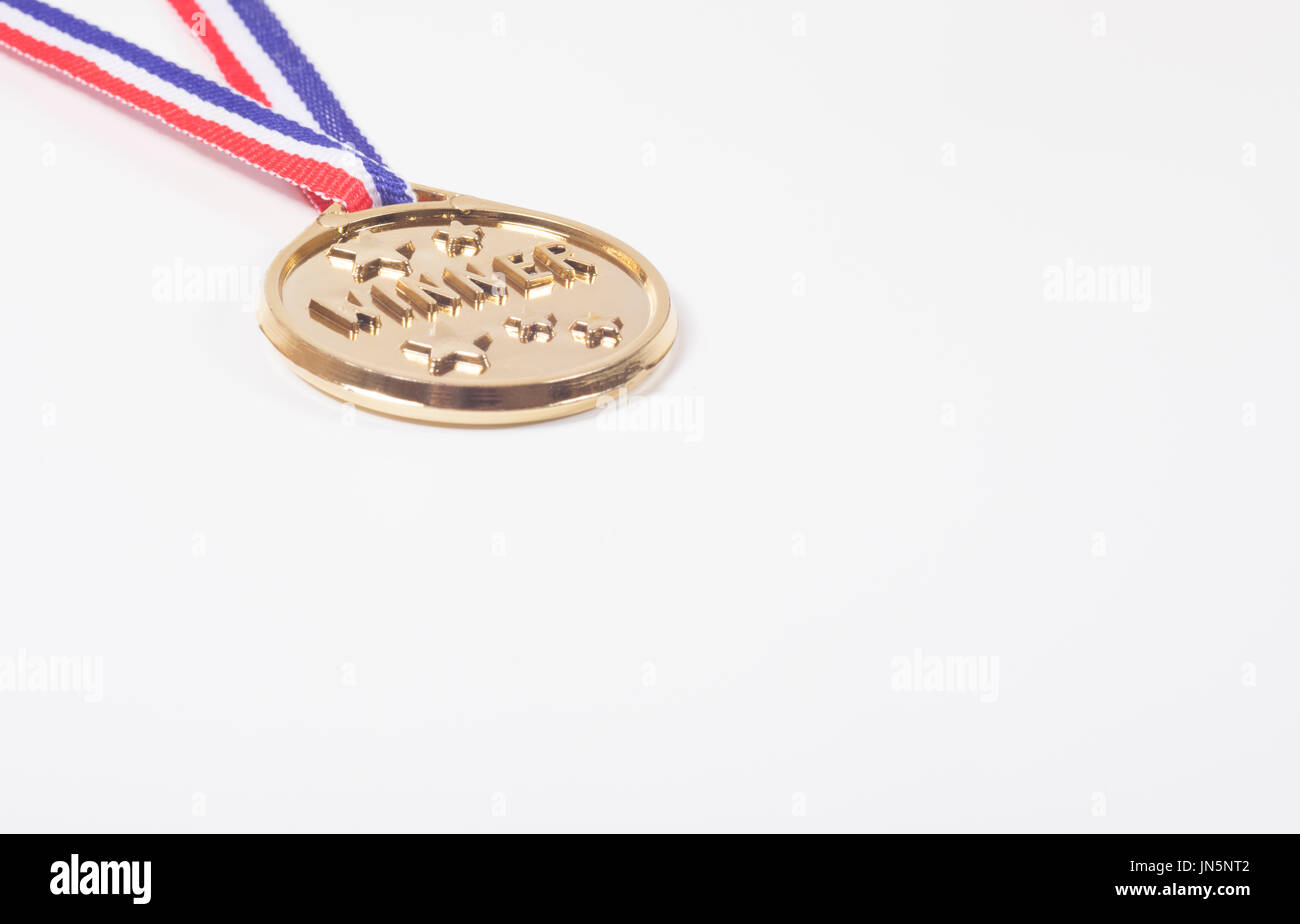 Engraved gold medal for the winner of a competition or sporting event ...