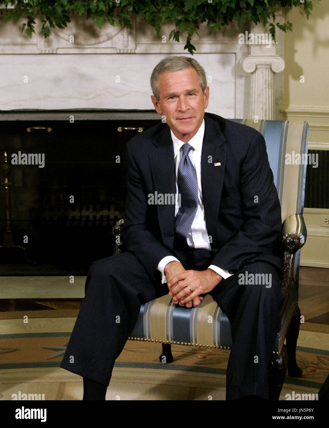 United States President George W. Bush poses for photographers in the ...