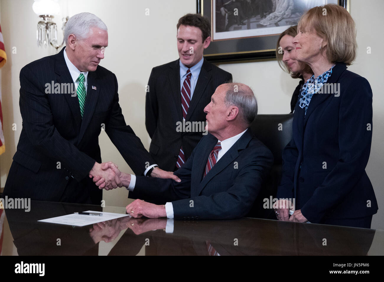 Director of National Intelligence Dan Coats (C), with his wife Marsha ...