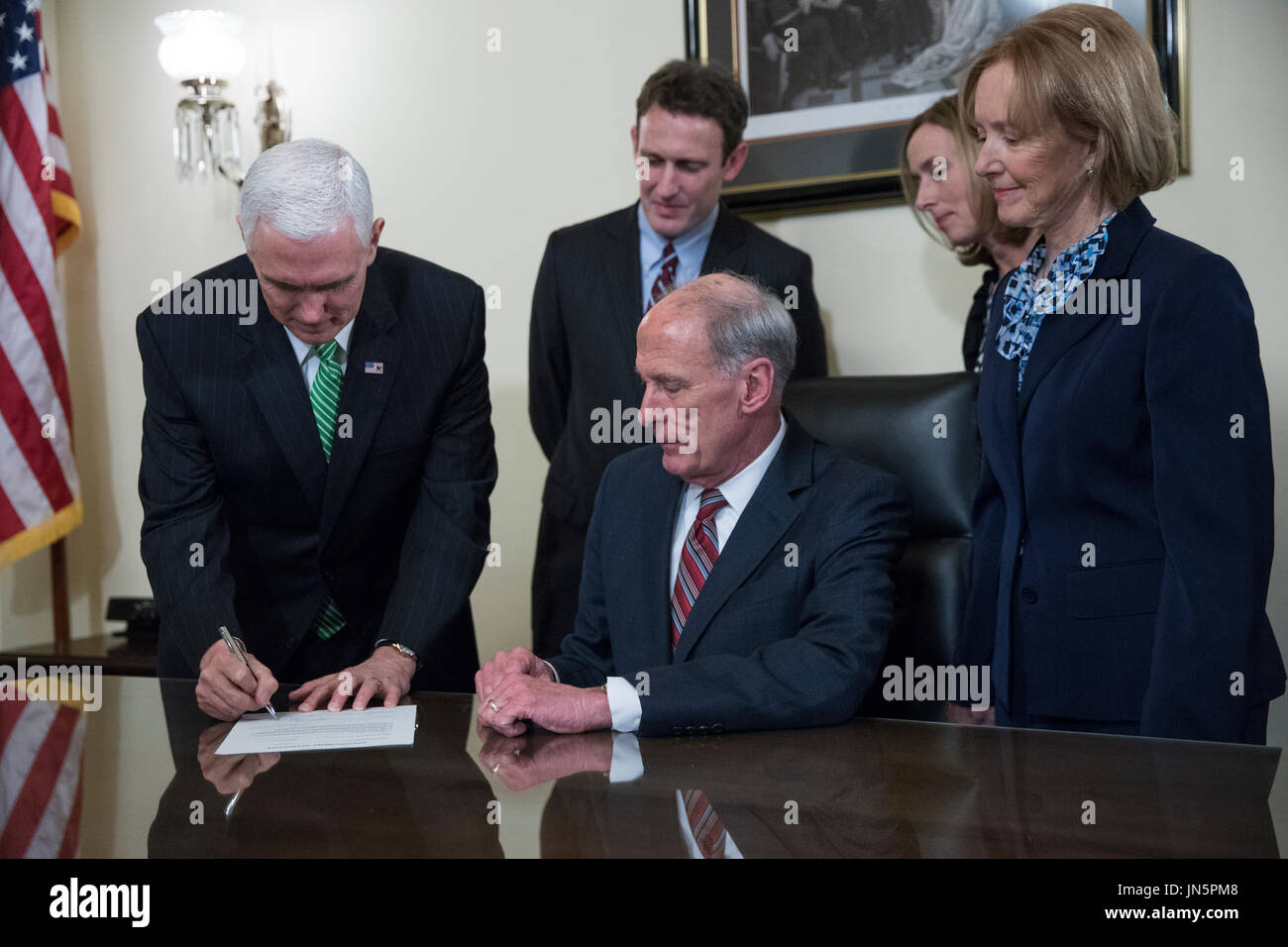 Director of National Intelligence Dan Coats (2-R), with his wife Marsha ...