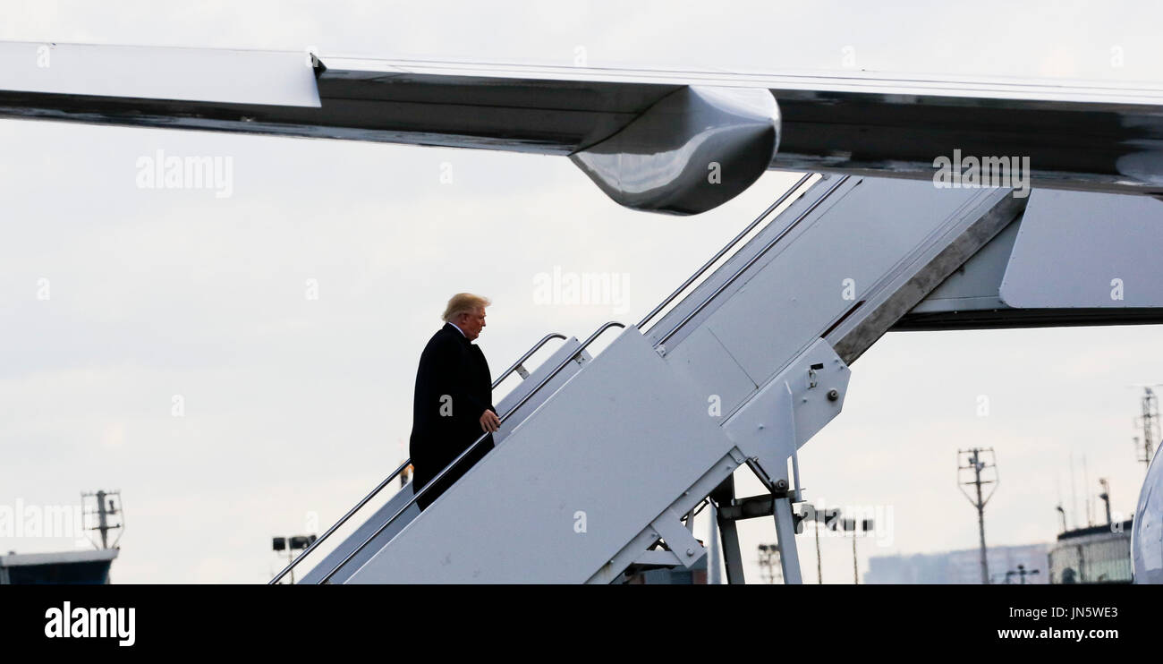 United States President-elect Donald Trump boards his plane at ...