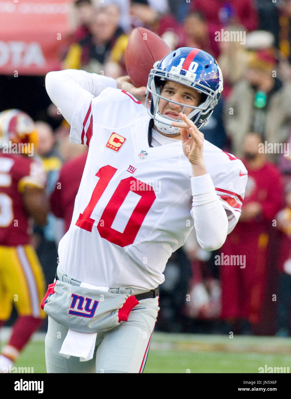 New York Giants quarterback Eli Manning (10) warms-up prior to the game ...