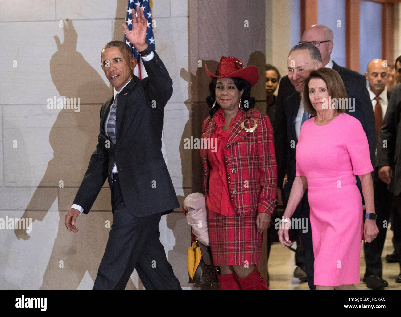 United States President Barack Obama walks with Rep. Frederica Wilson ...
