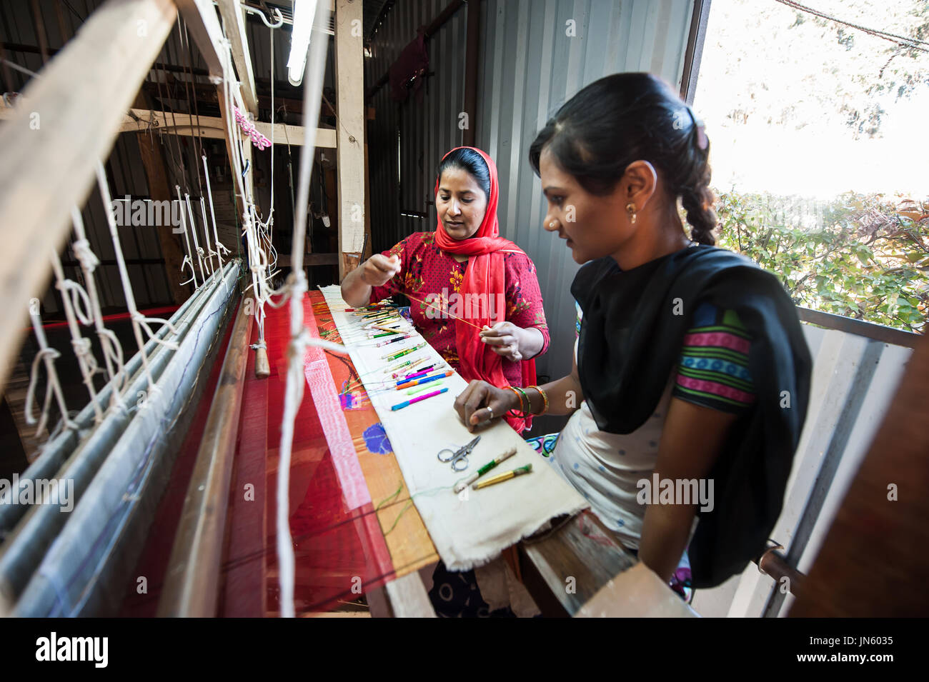 AURANGABAD, INDIA - 31 Dec 2016: People making colorful silk yarn ...