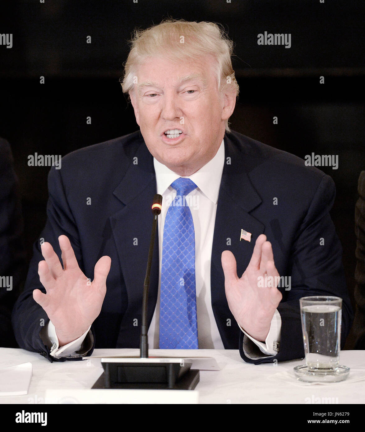 United States President Donald Trump speaks during a listening session ...