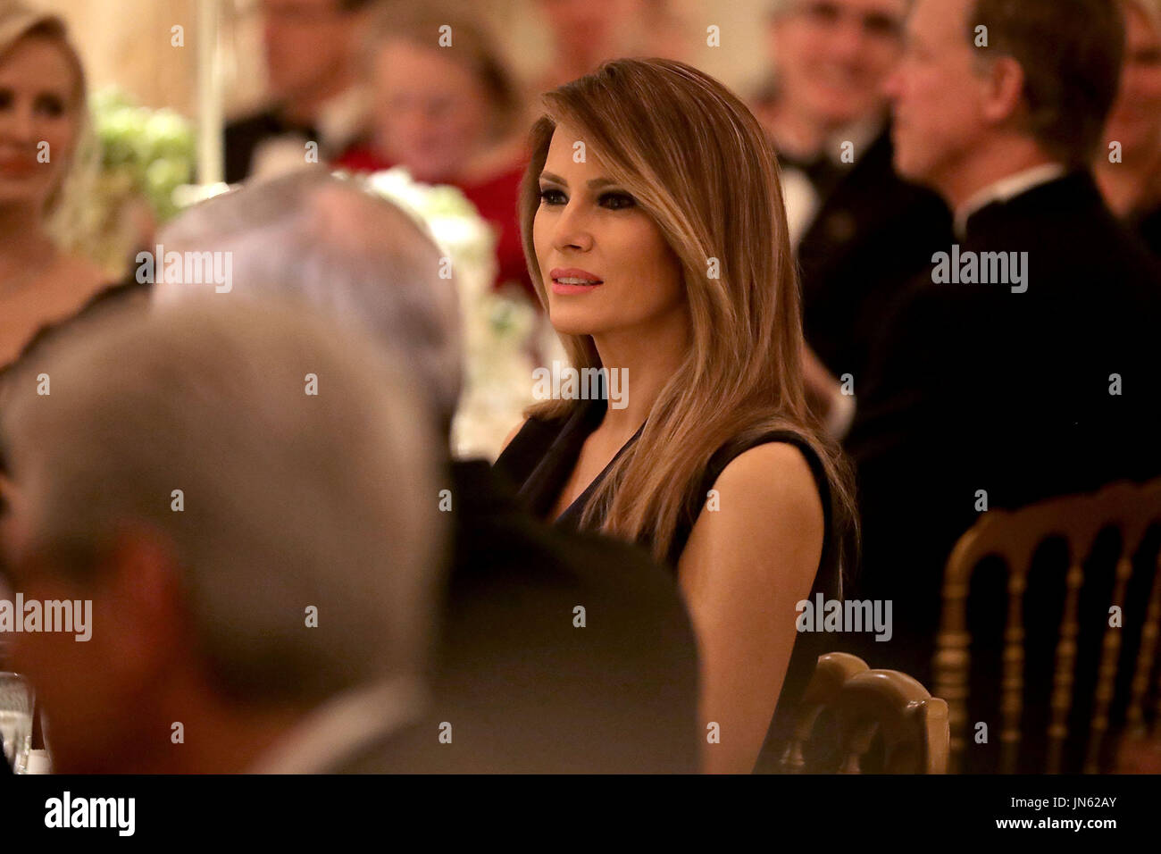 First lady Melania Trump listens to a toast by her husband United ...