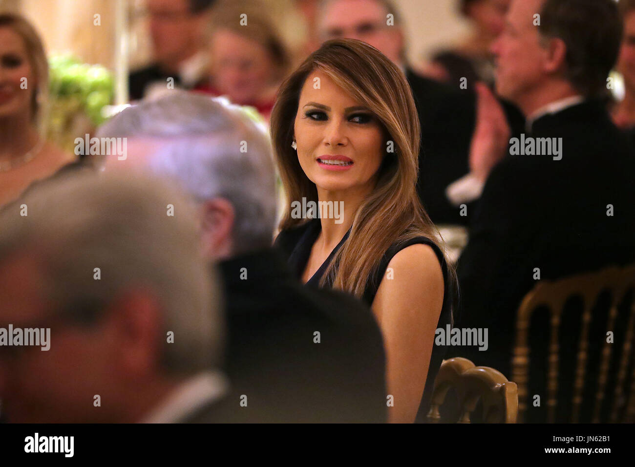 First lady Melania Trump listens to a toast by her husband United ...