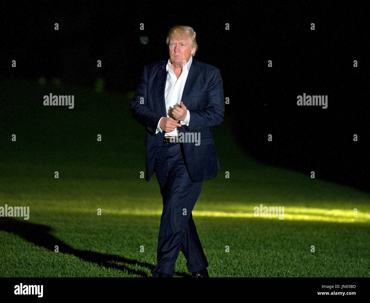 United States President Donald J. Trump walks on the South Lawn of the ...