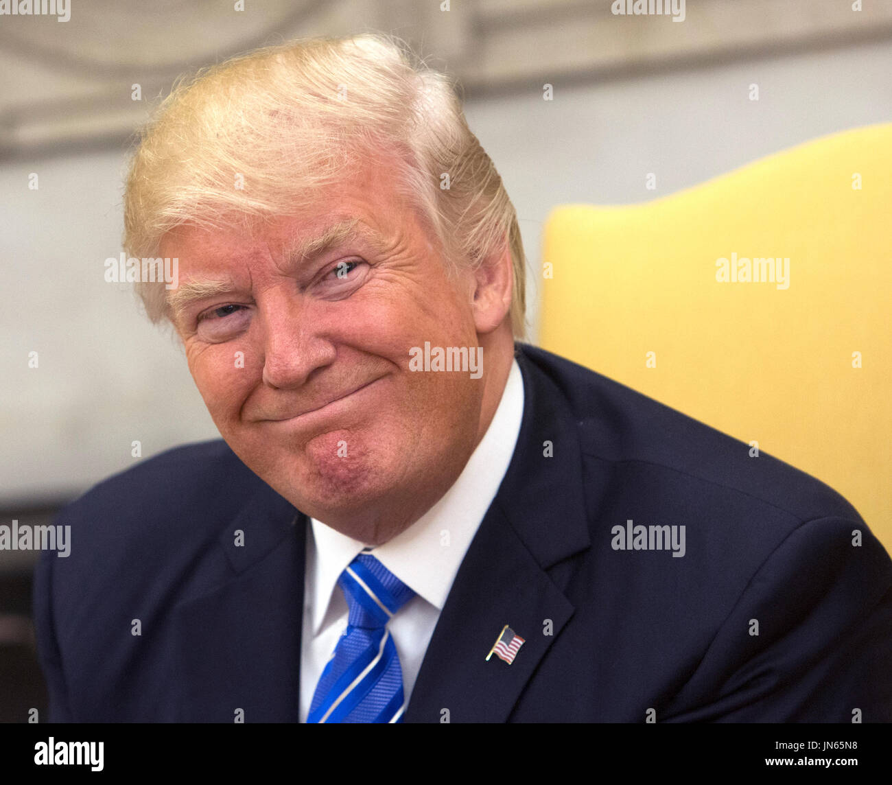 United States President Donald J. Trump poses for photos while meeting ...