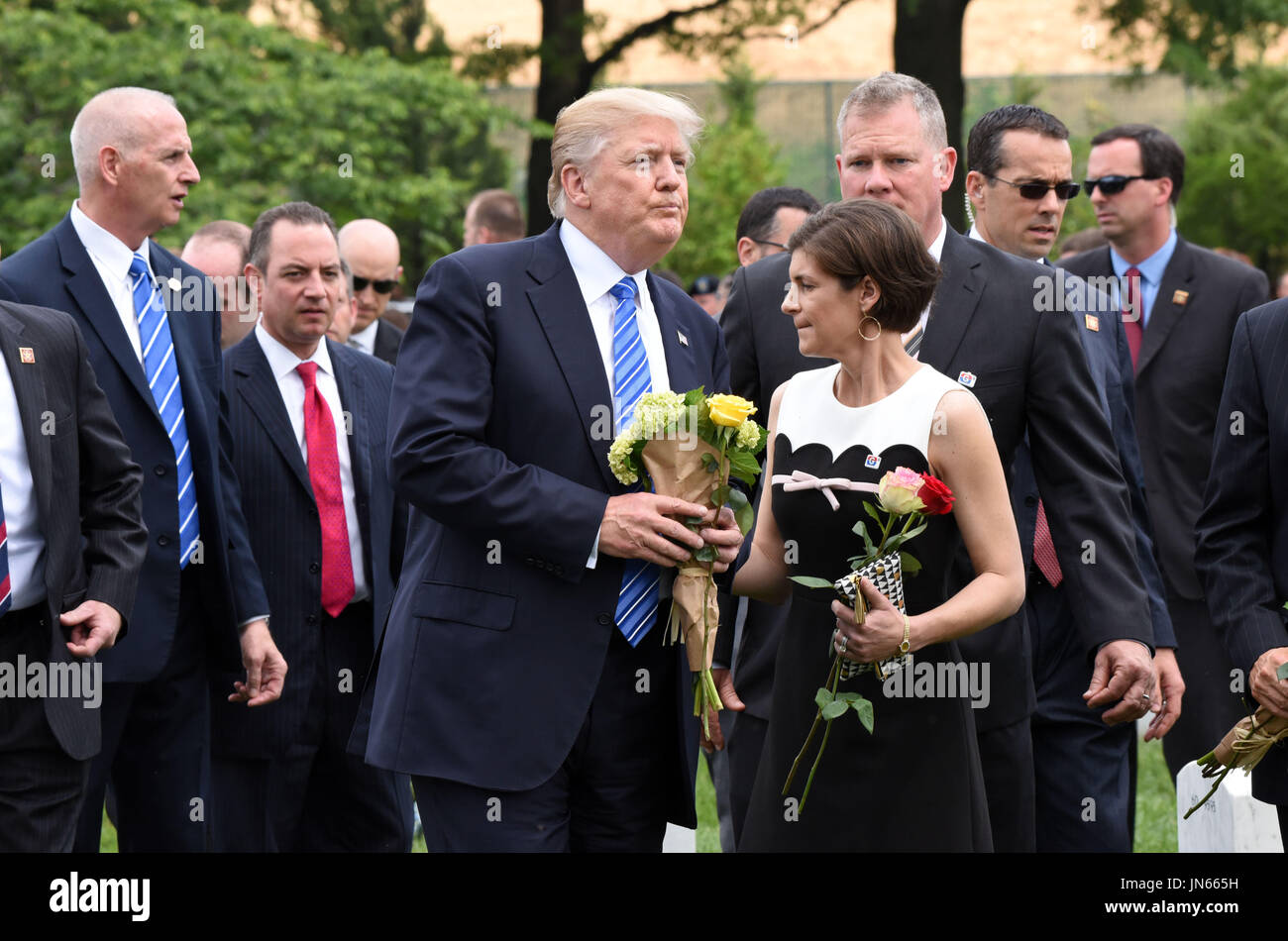 United States President Donald J. Trump walks through Section 60 after ...