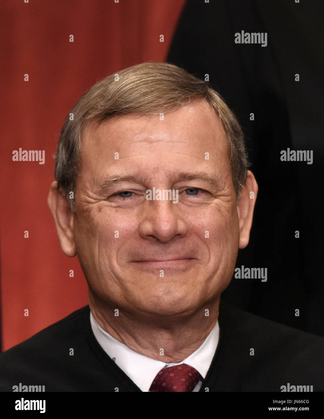 Chief Justice of the United States John G. Roberts poses during a group ...
