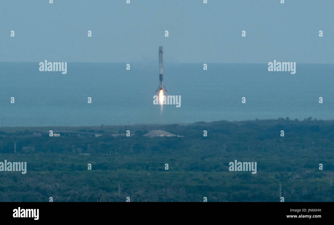 The SpaceX Falcon 9 first stage booster is seen as it lands shortly ...