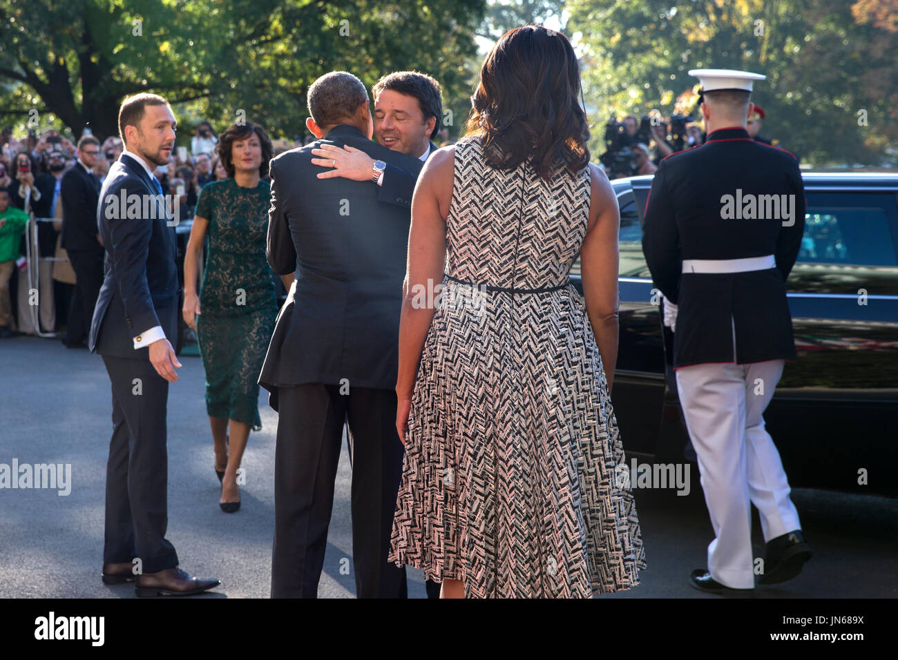 US President Barack Obama (2L), First Lady Michelle Obama (R) greet ...