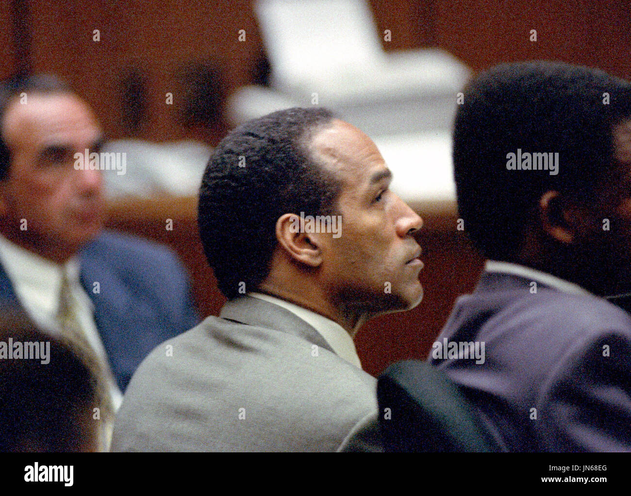 Former NFL star running back O.J. Simpson looks on during his trial of ...