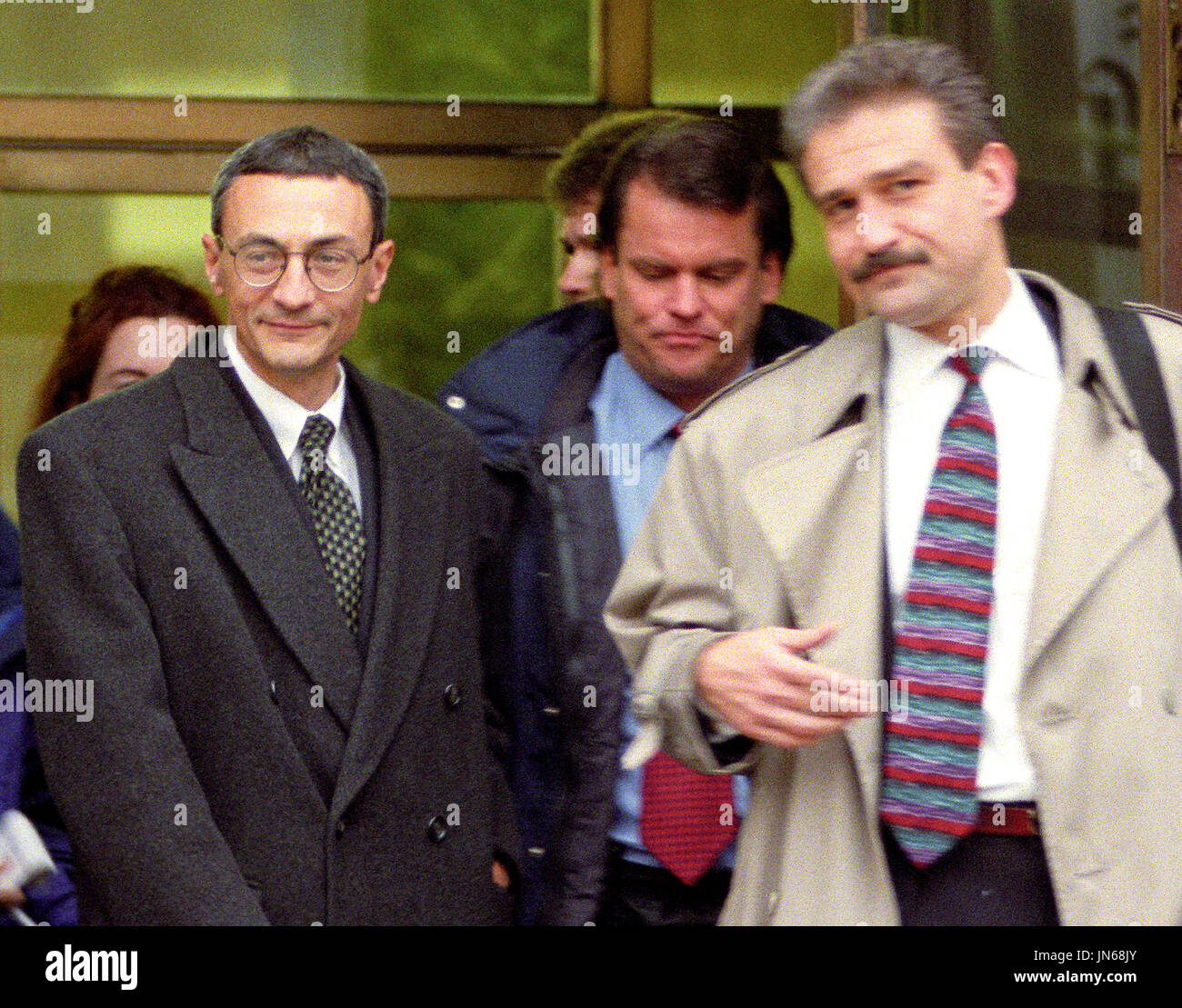 White House Deputy Chief of Staff for Operations John Podesta, left ...