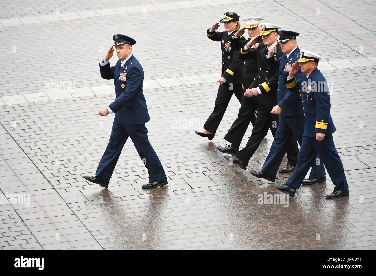 Senior military officers salute President Donald Trump during the 2017 ...