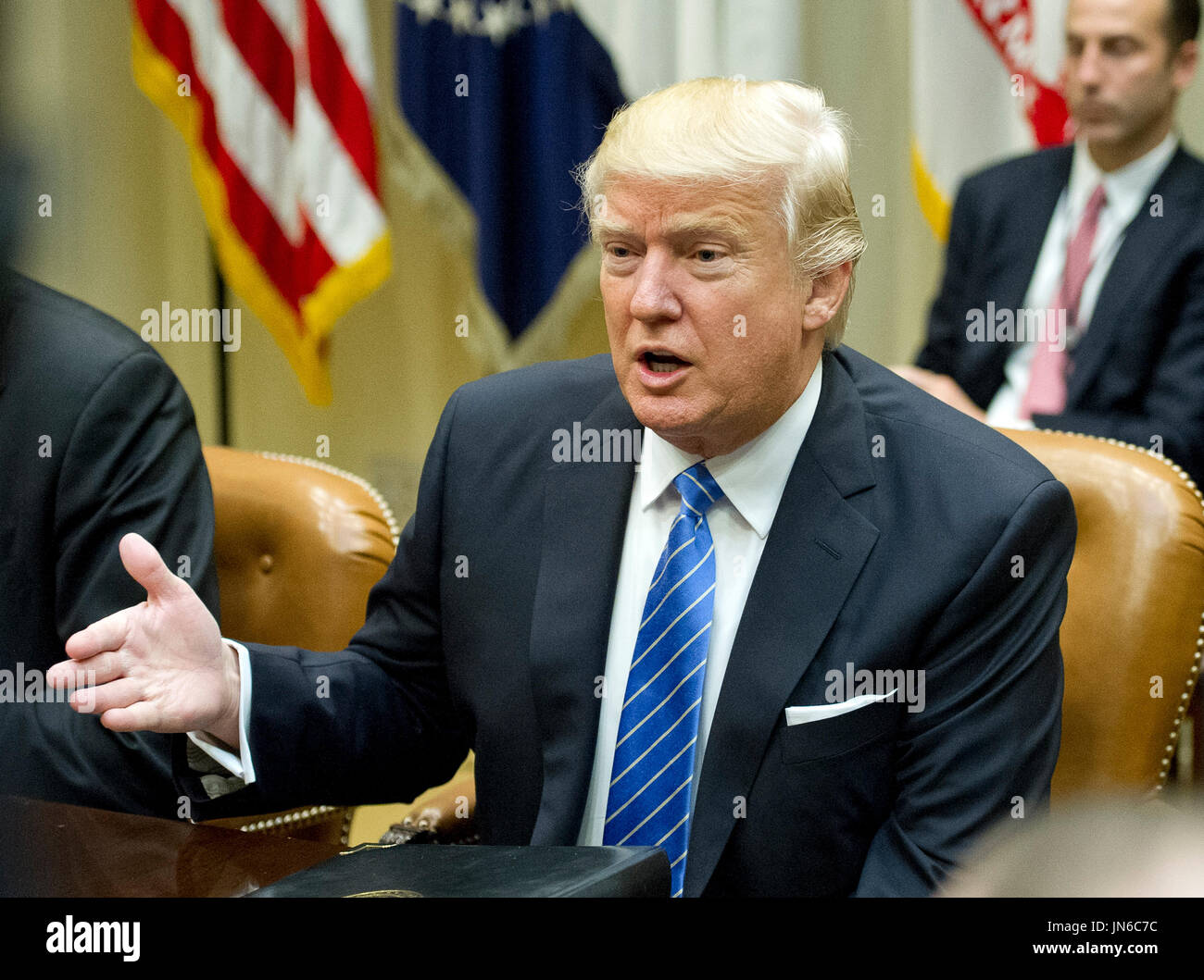 United States President Donald Trump makes remarks at a breakfast and ...
