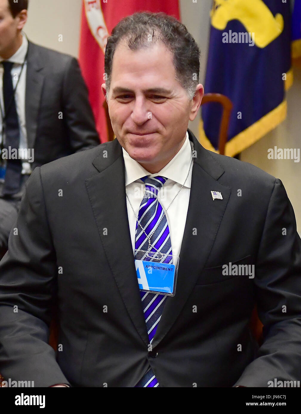 Michael Dell of Dell Technologies listens as United States President ...