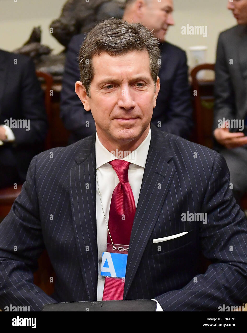 Alex Gorsky of Johnson & Johnson listens as United States President ...