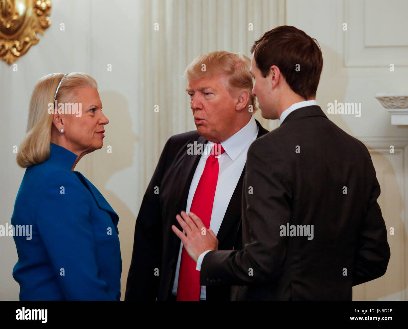 United States President Donald speaks with Ginni Rometty, CEO of IBM (L ...